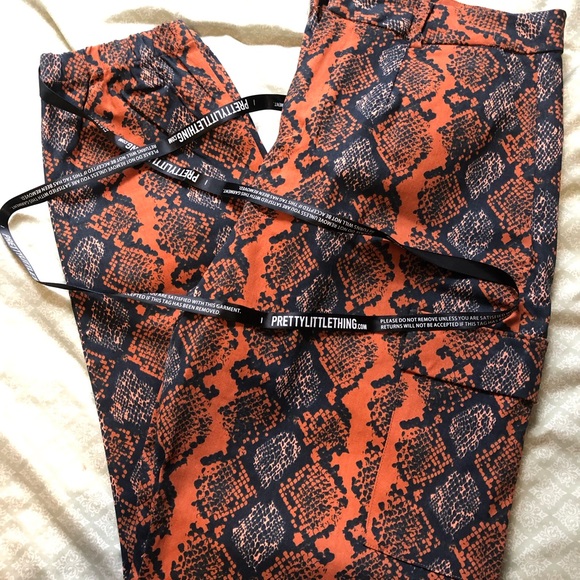PrettyLittleThing | Pants & Jumpsuits | Burnt Orange Snake Print Cargo ...